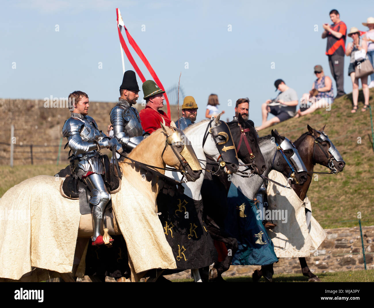 Mounted Knights parade in formation at the end of the Jousting ...