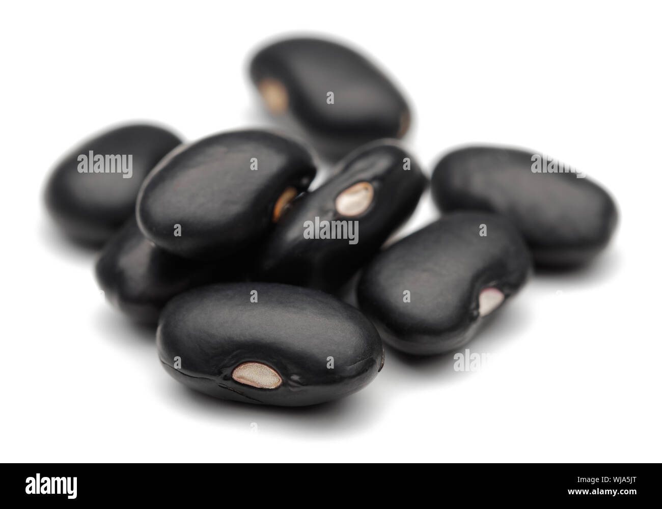 Group of black beans isolated on white background Stock Photo - Alamy