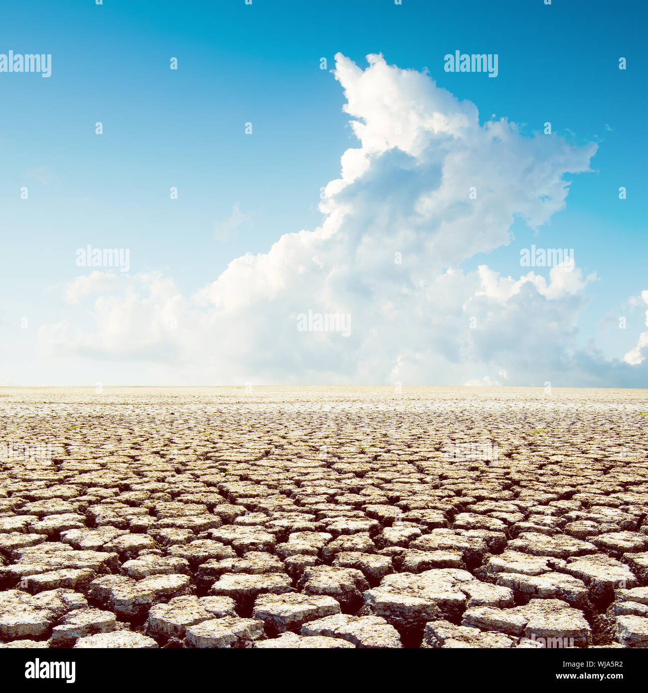global warming. hot weather in desert under clouds Stock Photo - Alamy
