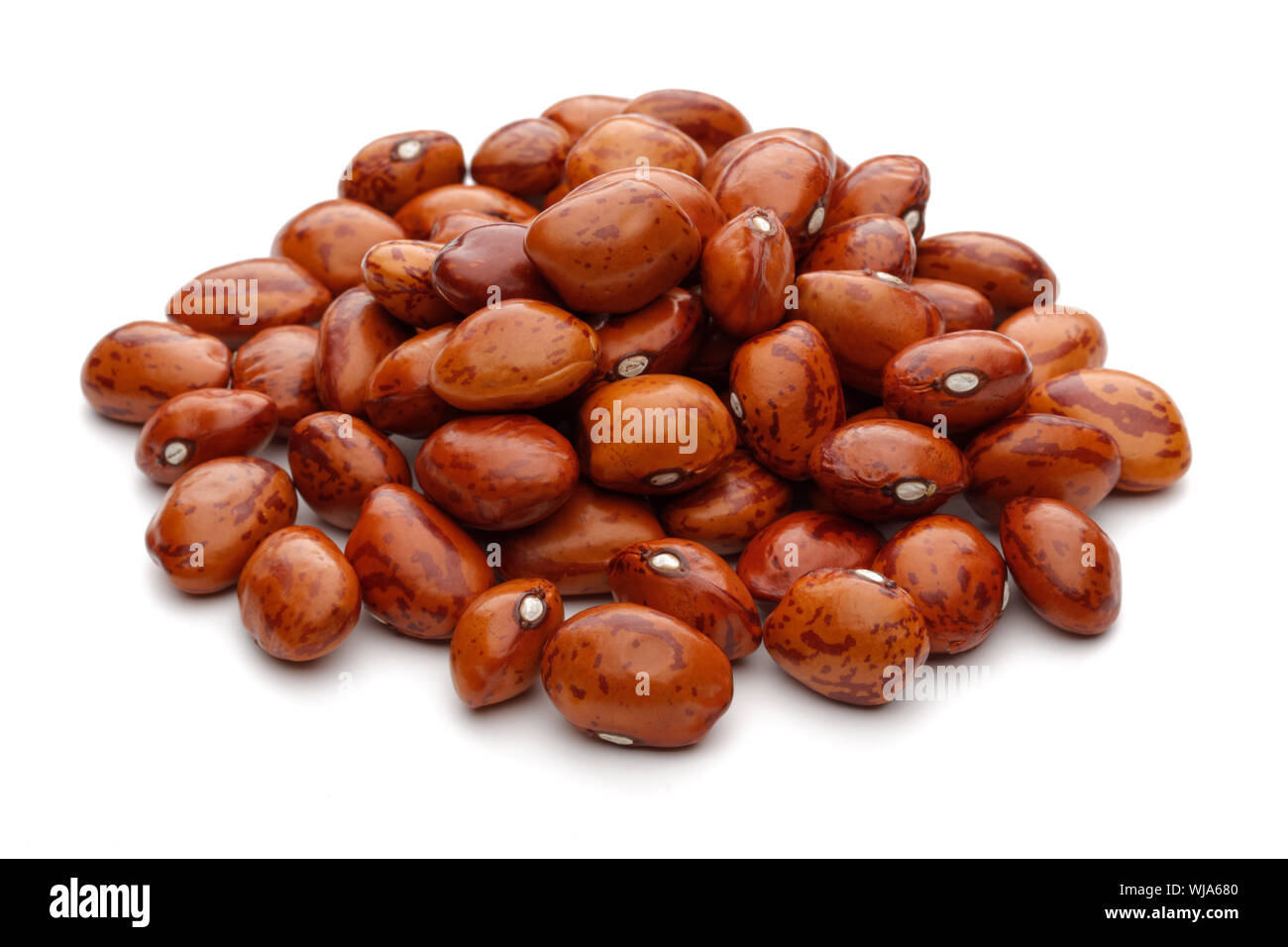 Heap of red pinto beans isolated on white background Stock Photo - Alamy