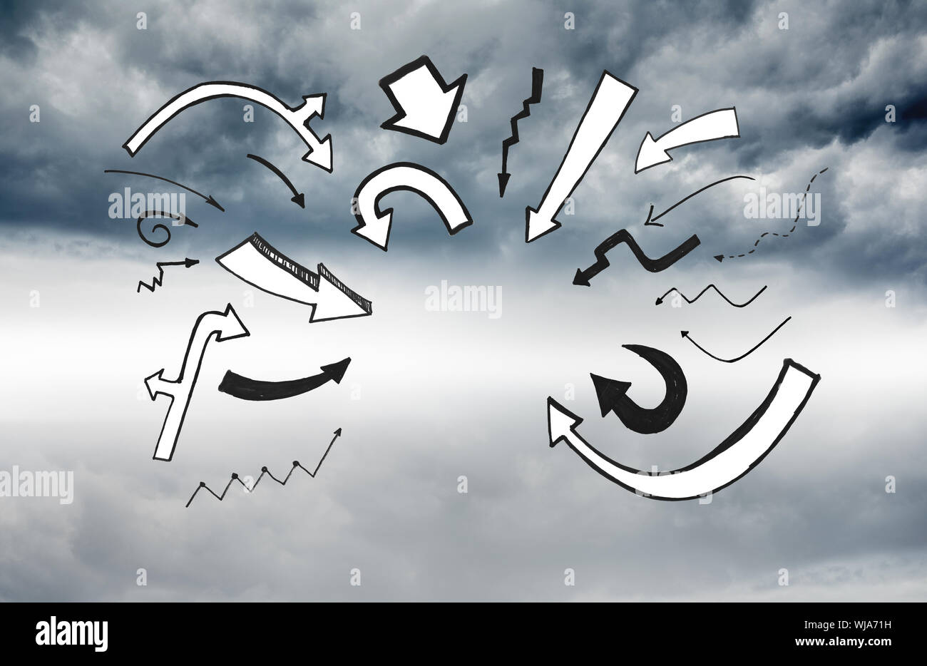Arrows on sky background Stock Photo - Alamy