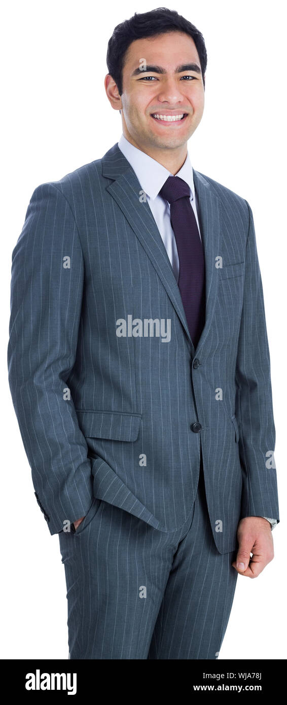 Smiling businessman standing Stock Photo - Alamy