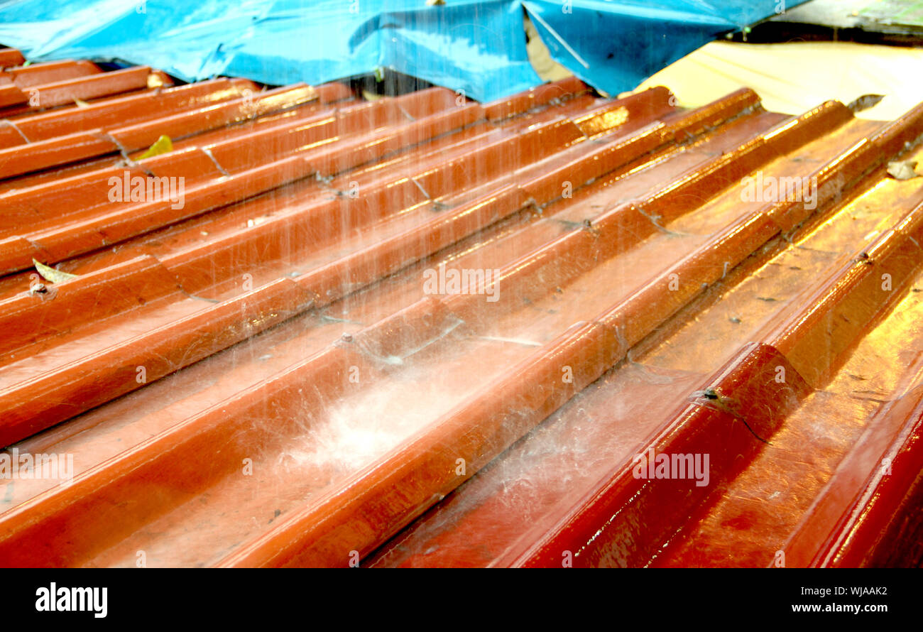 Rain falling roof hi-res stock photography and images - Alamy