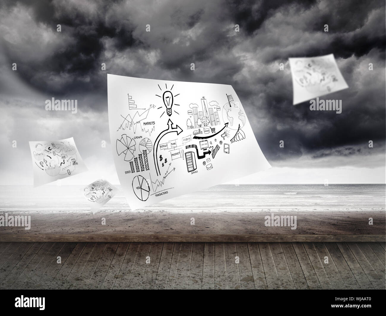 Sheets with graphics over sky on wall Stock Photo - Alamy