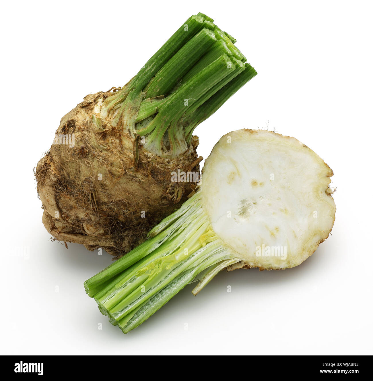 Fresh celeriac root with slice isolated background Stock Photo - Alamy