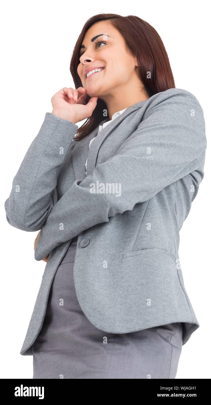 Smiling thoughtful woman brown hi-res stock photography and images - Alamy