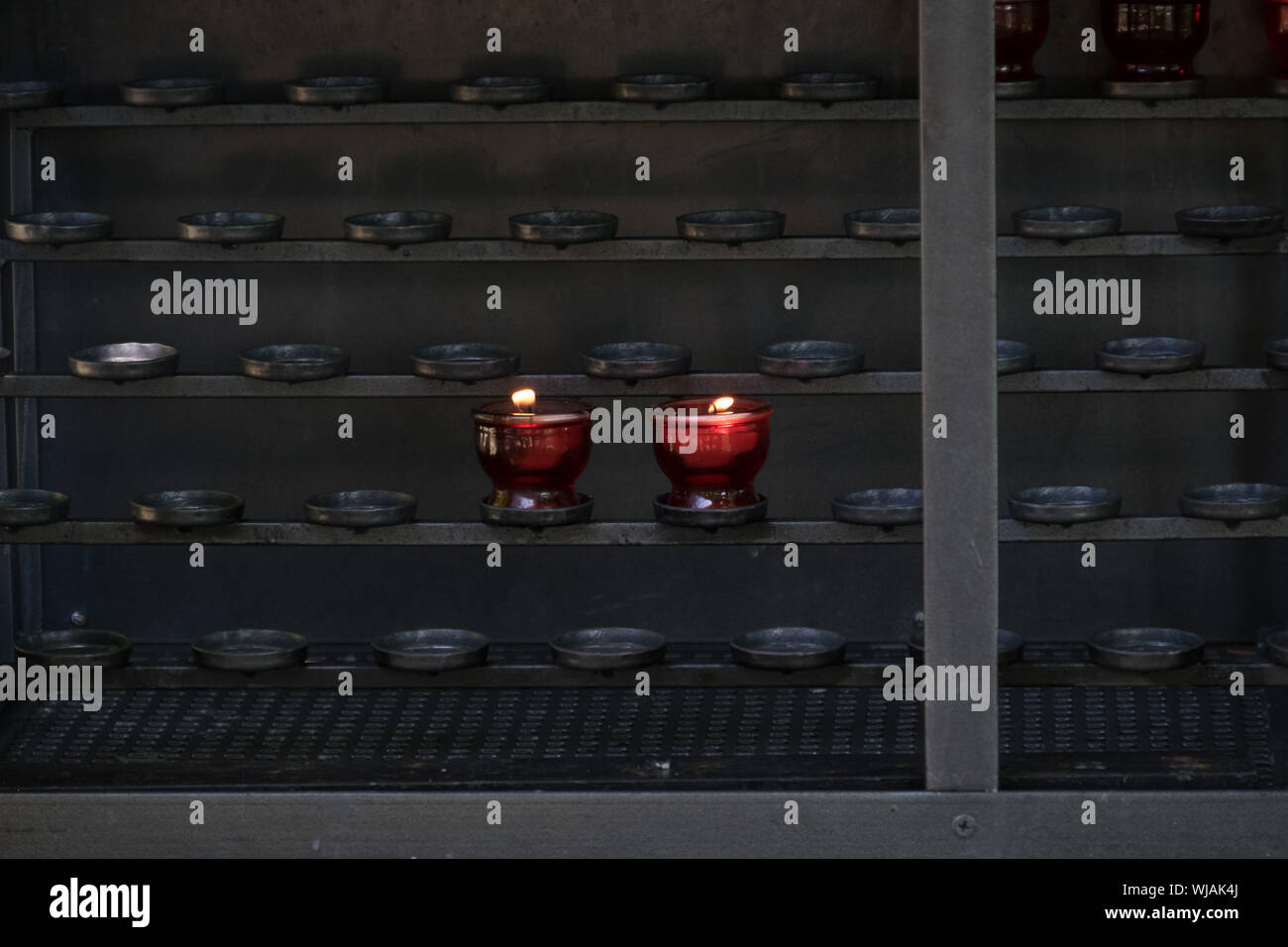 Rack of candles hi-res stock photography and images - Alamy