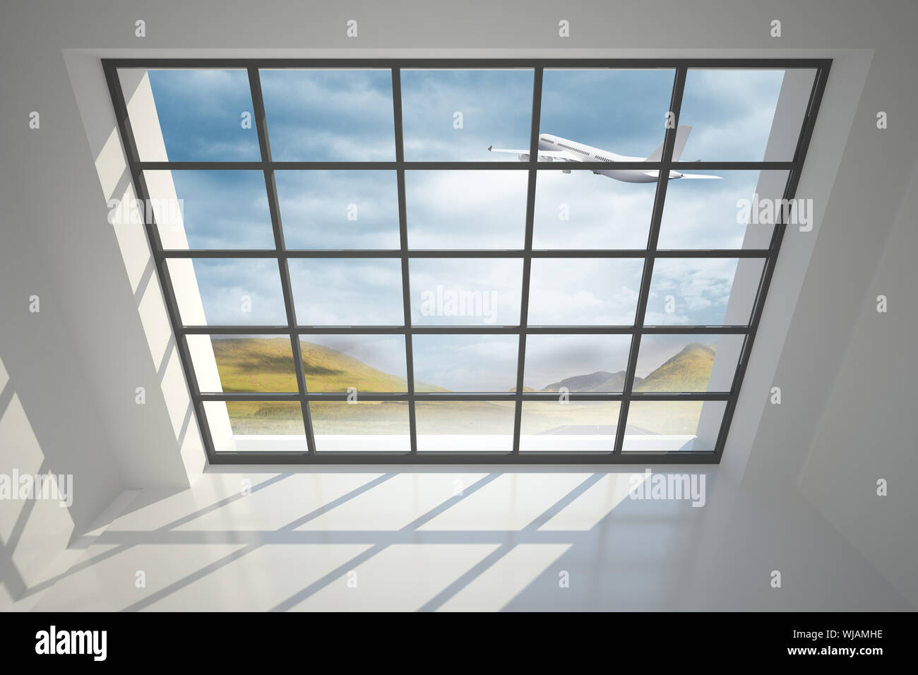 Airplane flying past window Stock Photo - Alamy