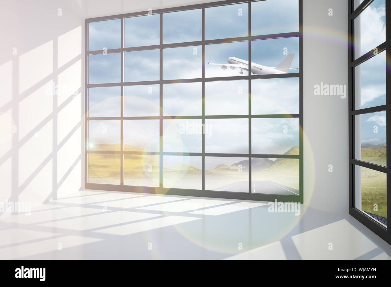 Airplane flying past window Stock Photo - Alamy
