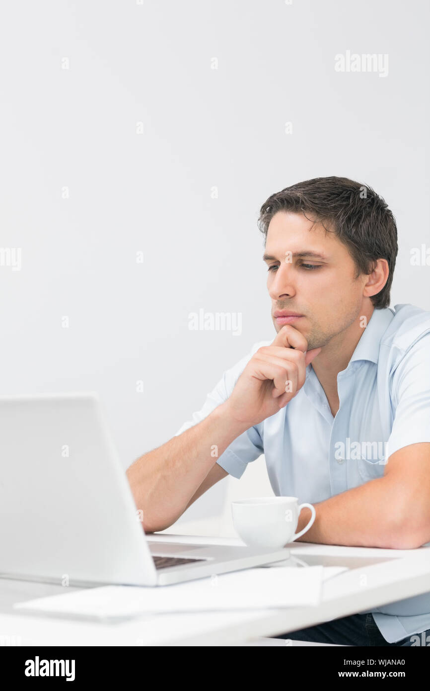Serious young man home hi-res stock photography and images - Alamy