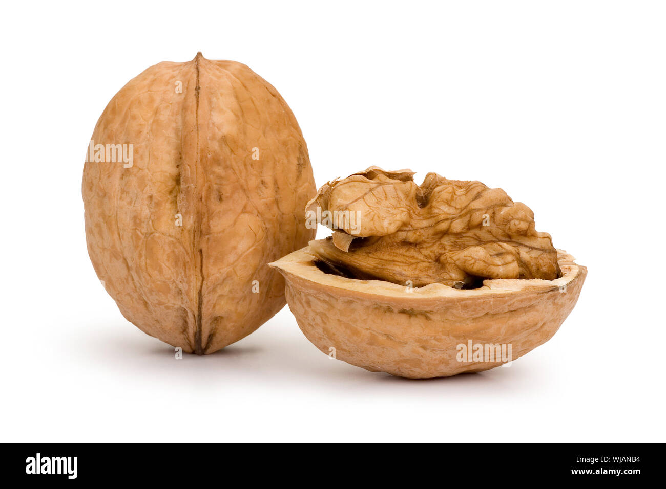 Broken walnut isolated on white background Stock Photo - Alamy