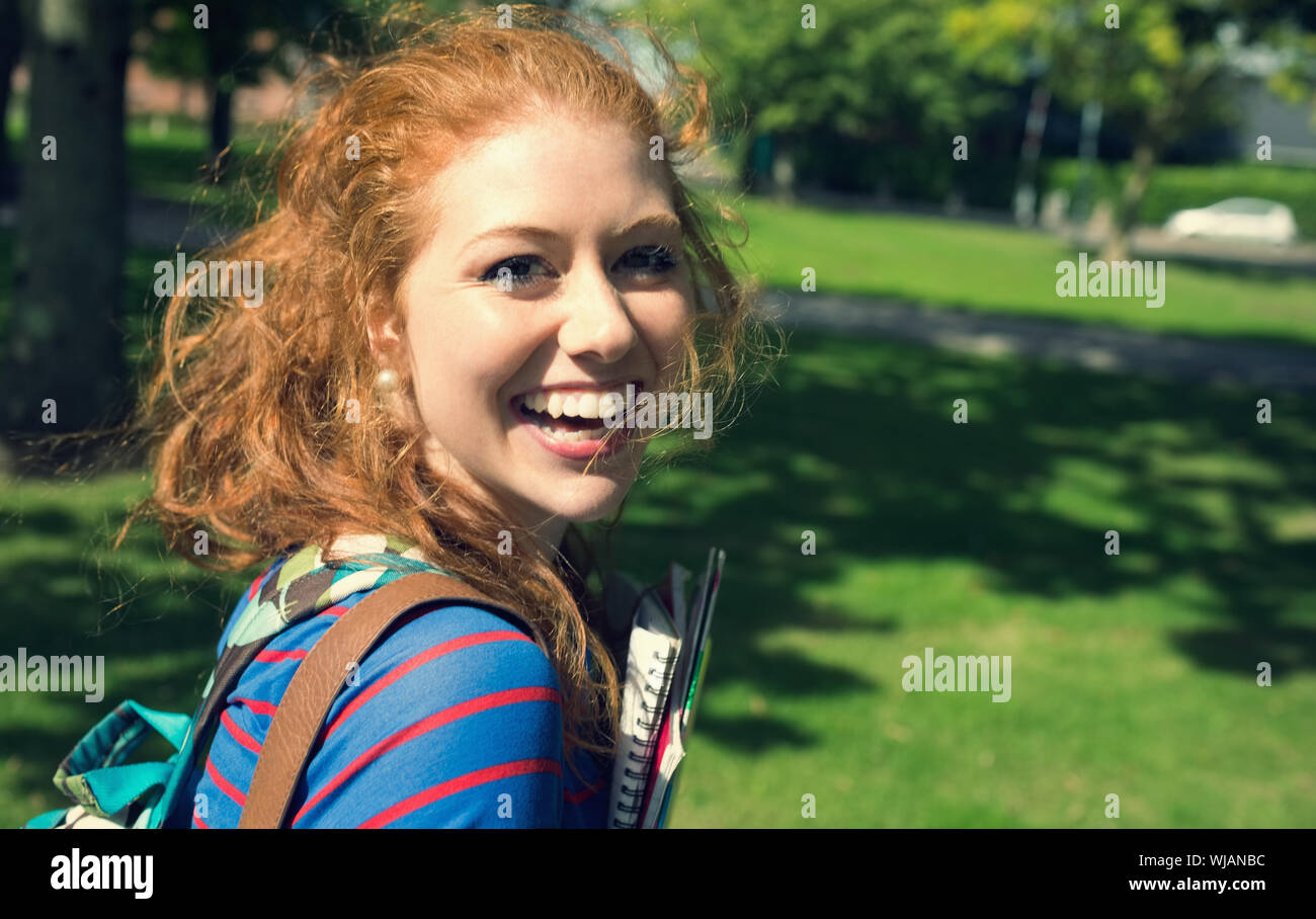 Cheerful student looking at camera Stock Photo - Alamy