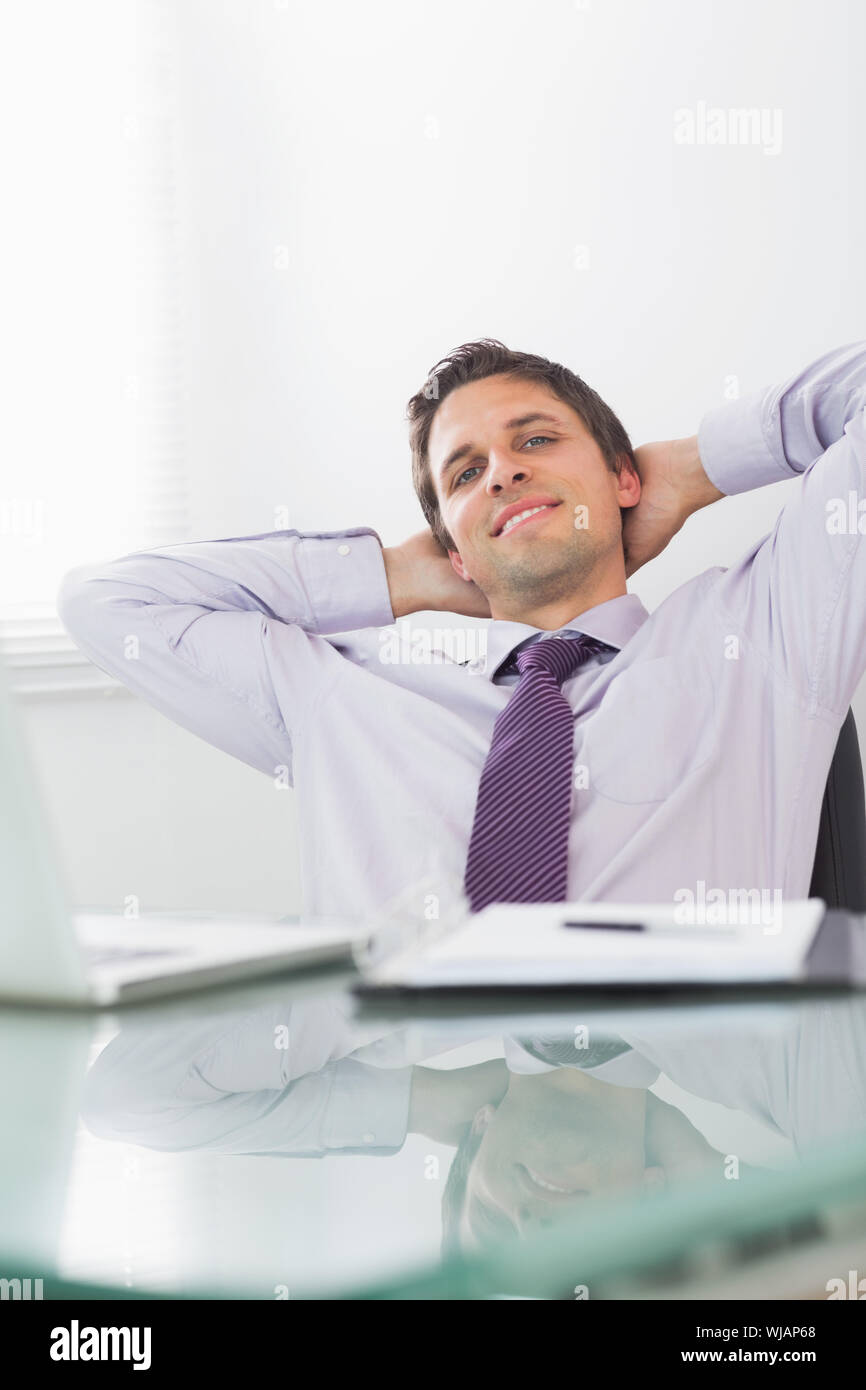 Relaxed hands behind head hi-res stock photography and images - Alamy