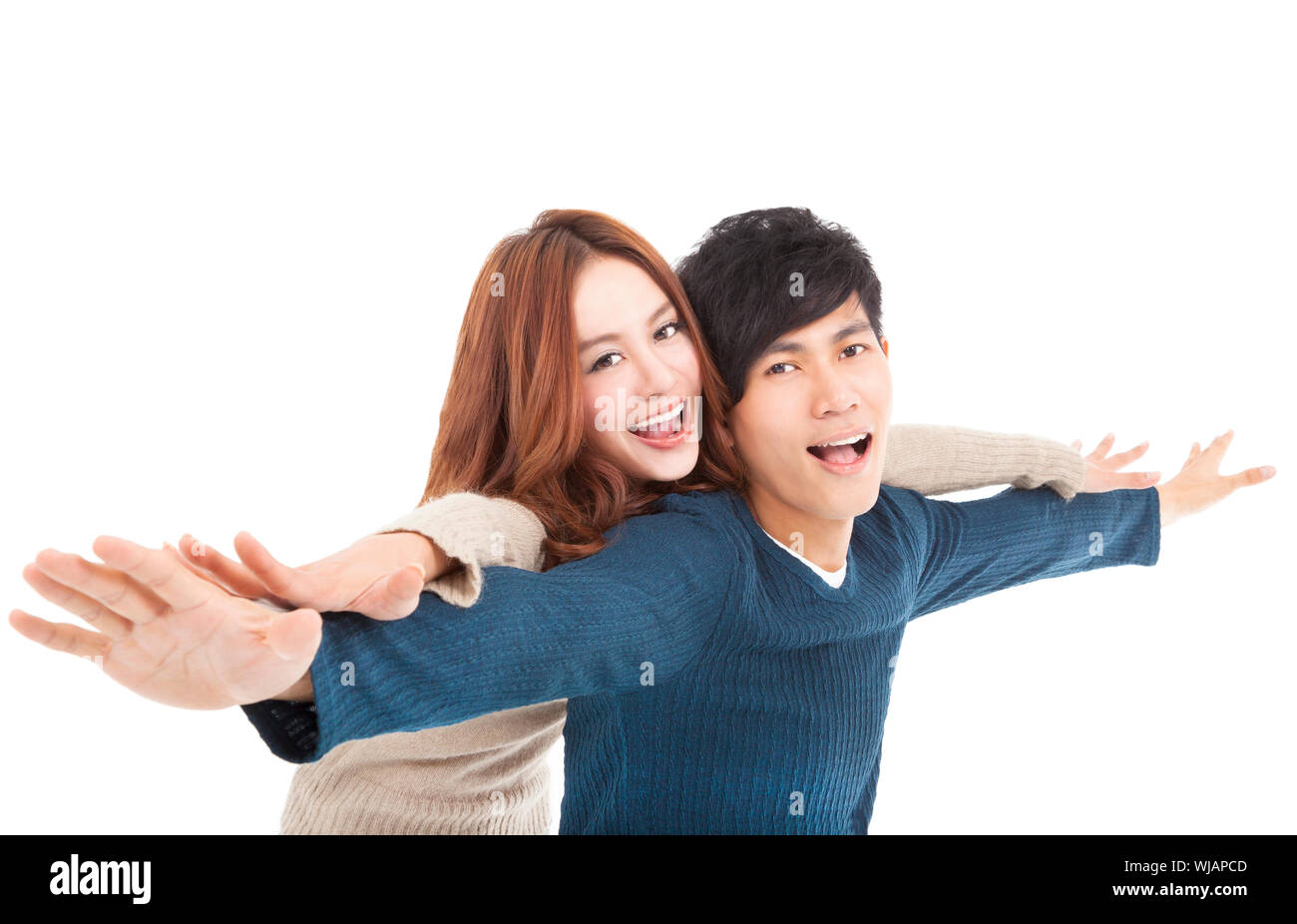 happy young couple hugging together Stock Photo - Alamy