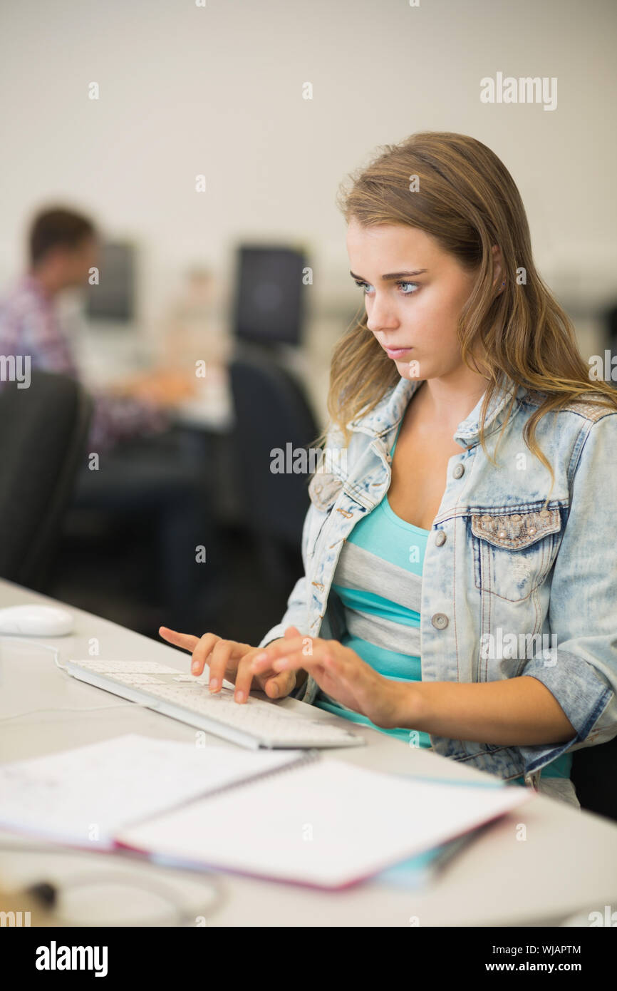 Young adult serious computer hi-res stock photography and images - Alamy