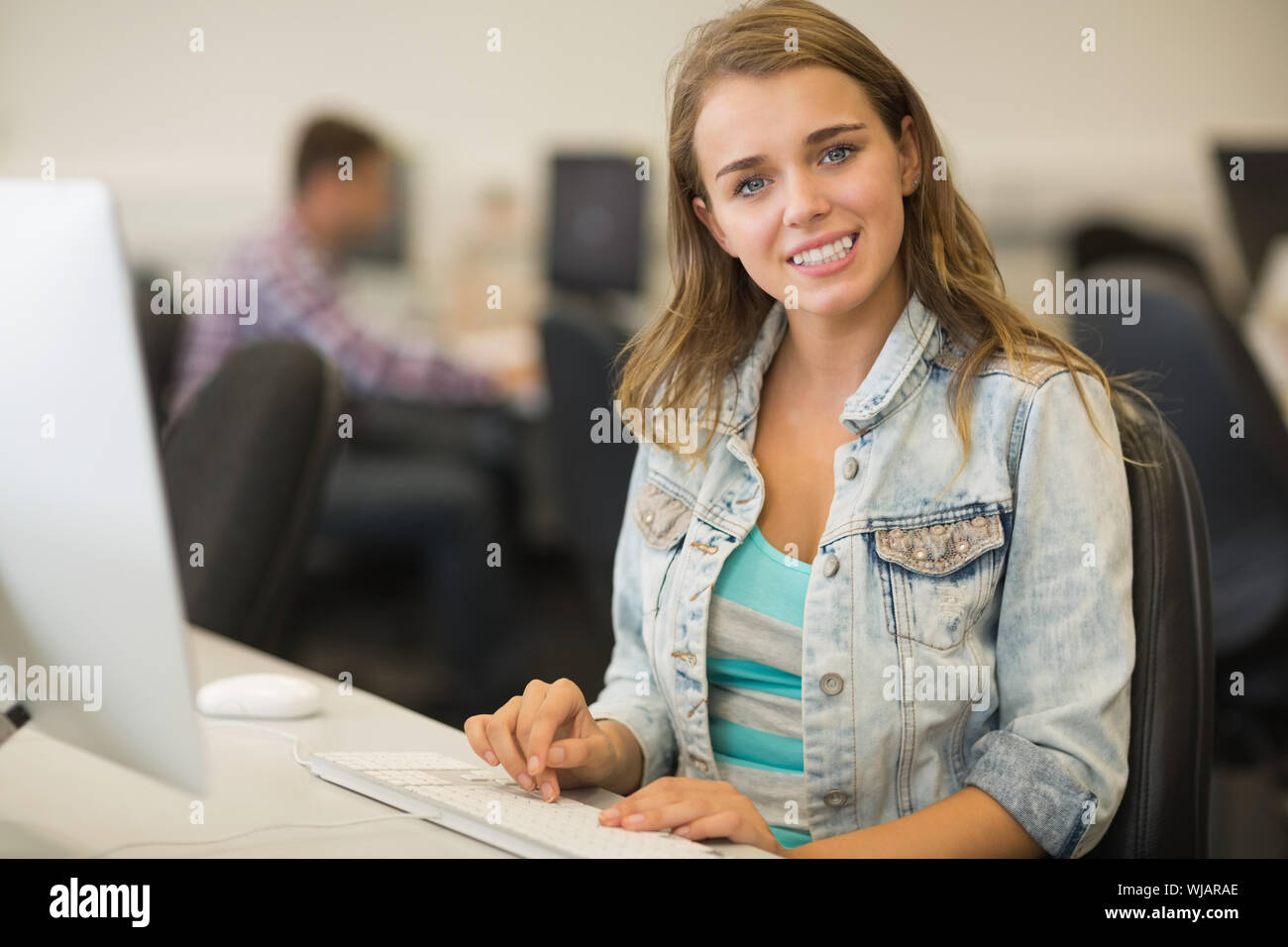 Male student typing computer in hi-res stock photography and images - Alamy
