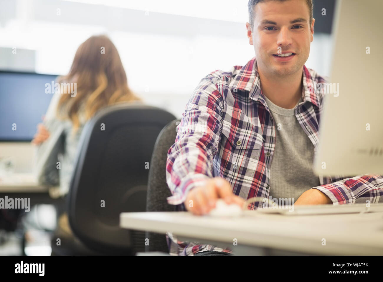 Cheerful female student looking camera hi-res stock photography and ...