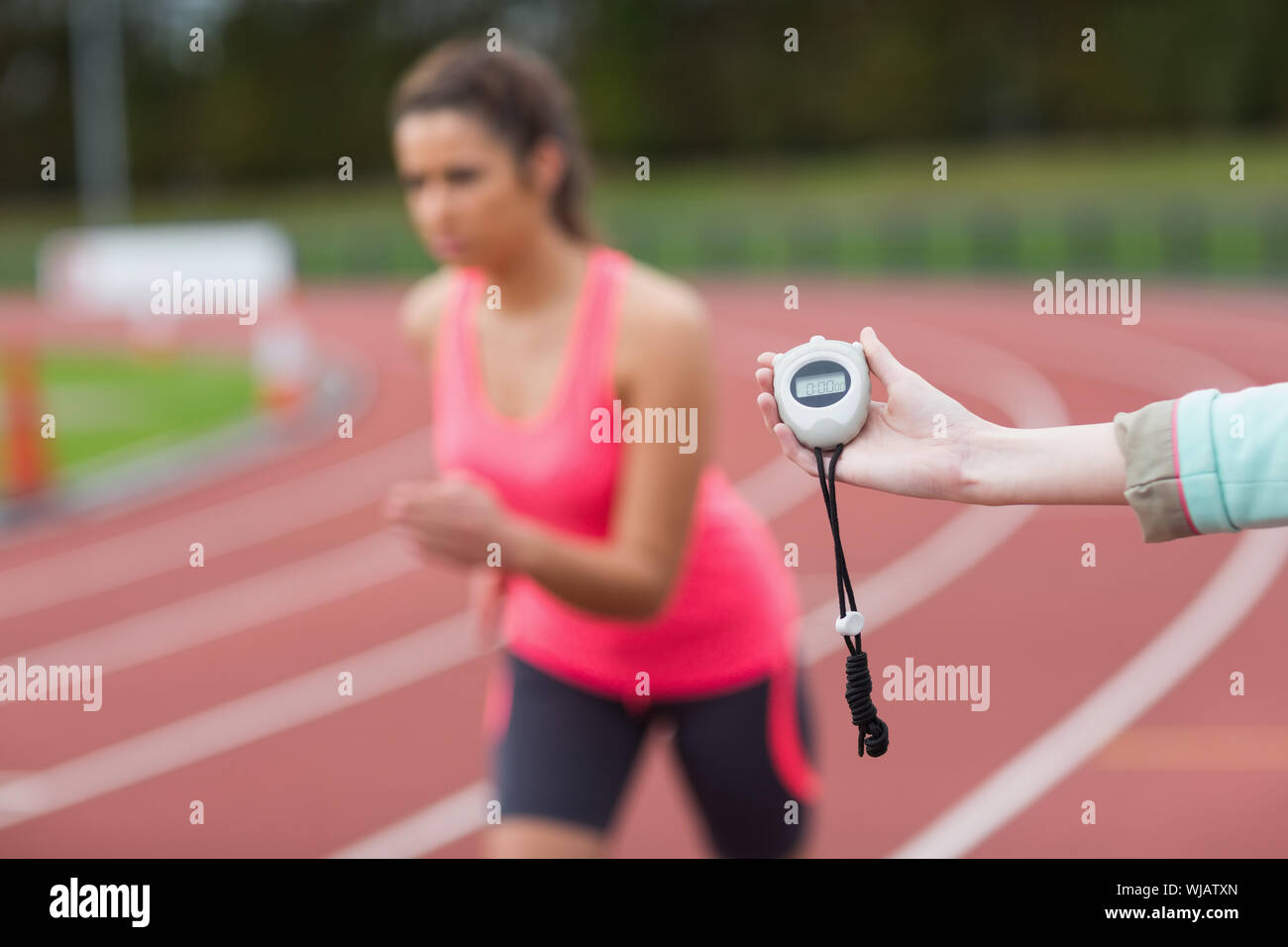 Hand timing hi-res stock photography and images - Alamy