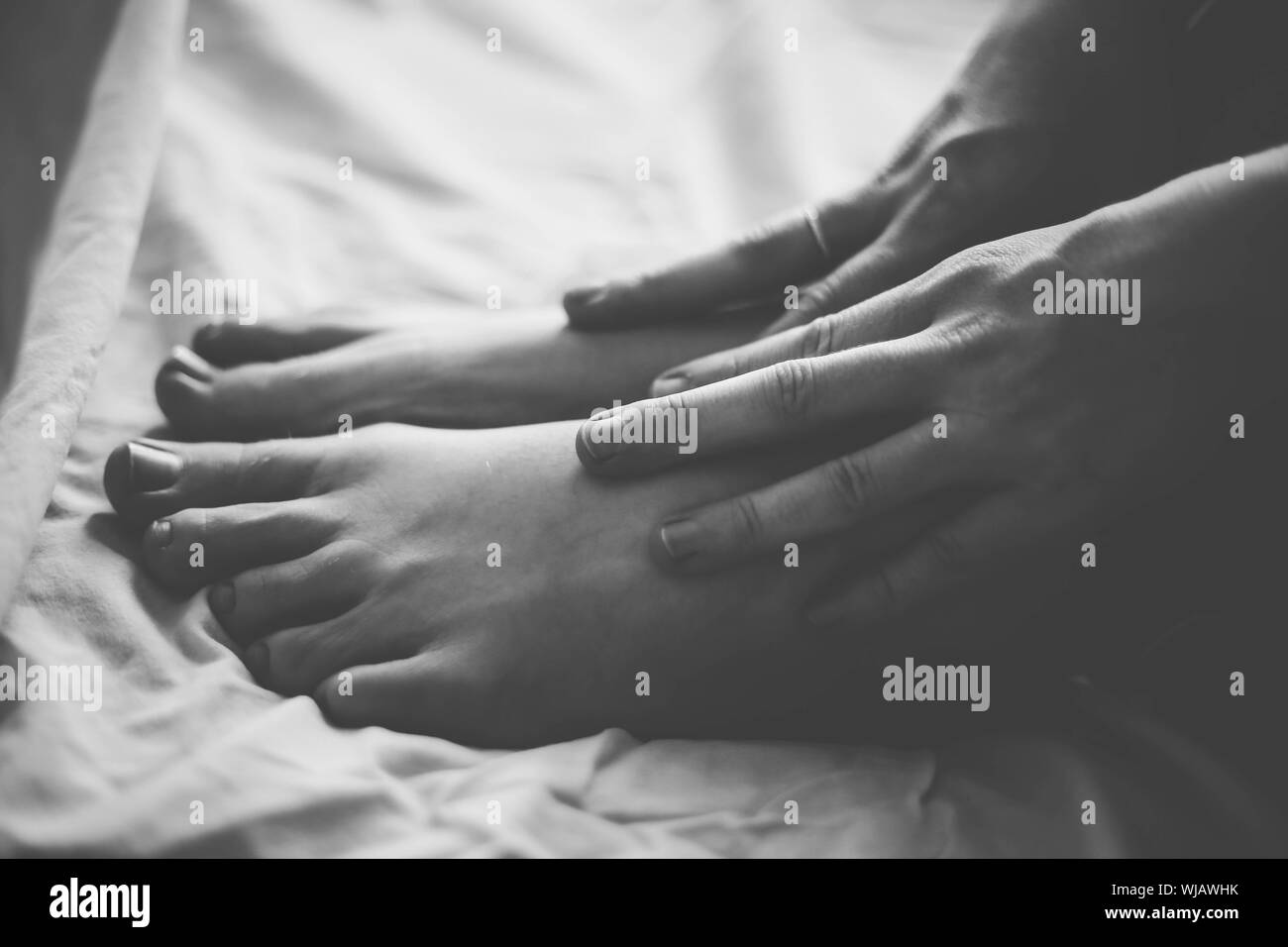 Touching Feet High Resolution Stock Photography and Images - Alamy