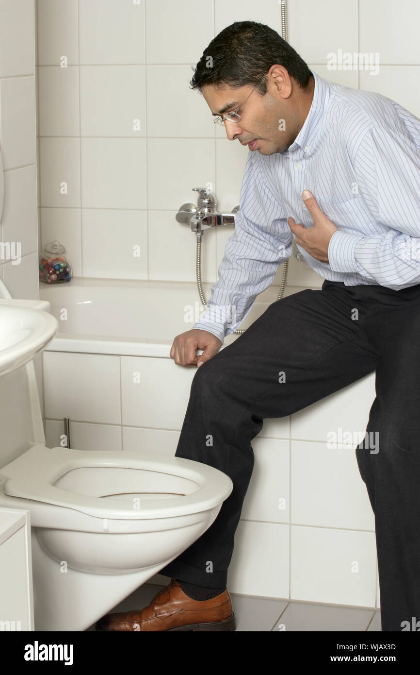 Photo of an adult male in his late thirties with stomach sickness about ...