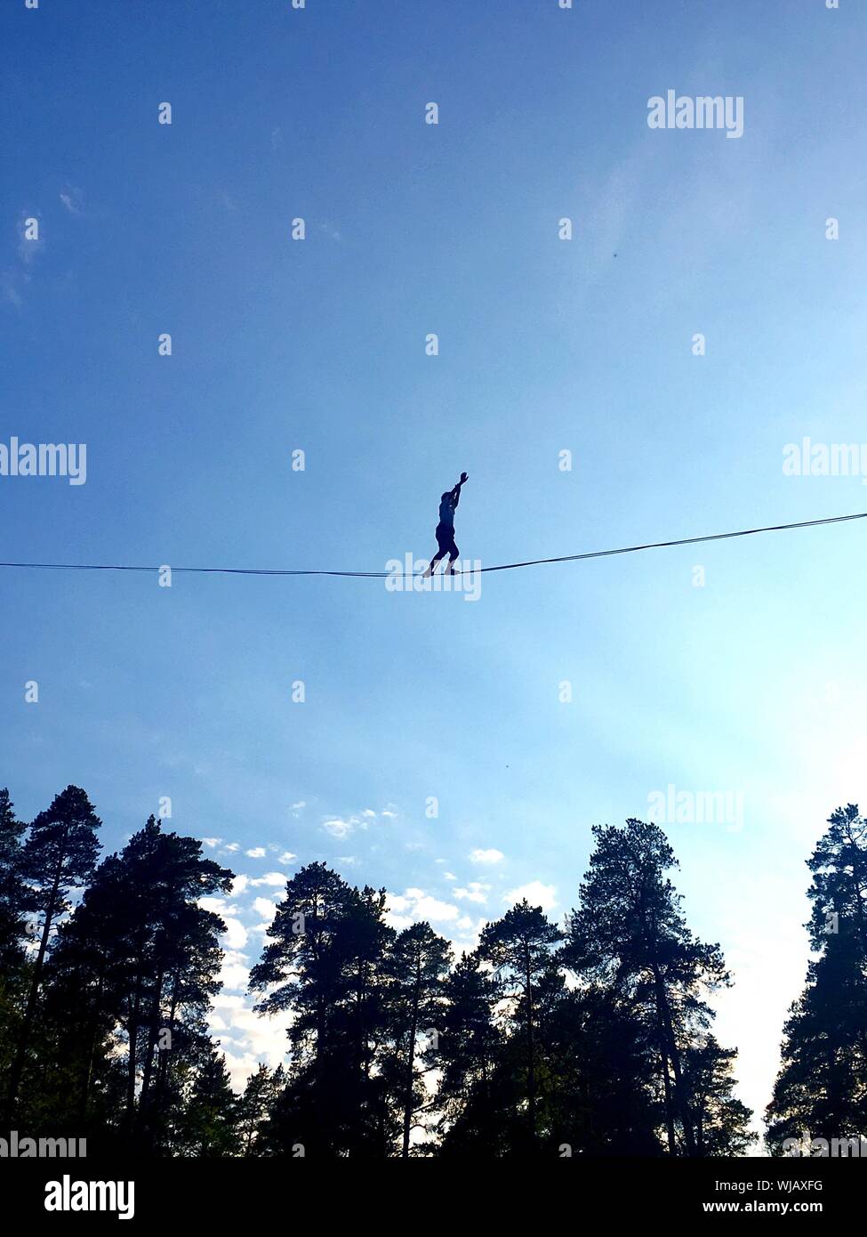 Tightrope walking hi-res stock photography and images - Alamy