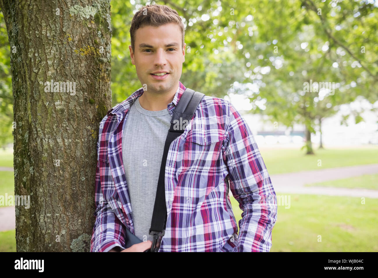 Handsome college student on campus hi-res stock photography and images ...