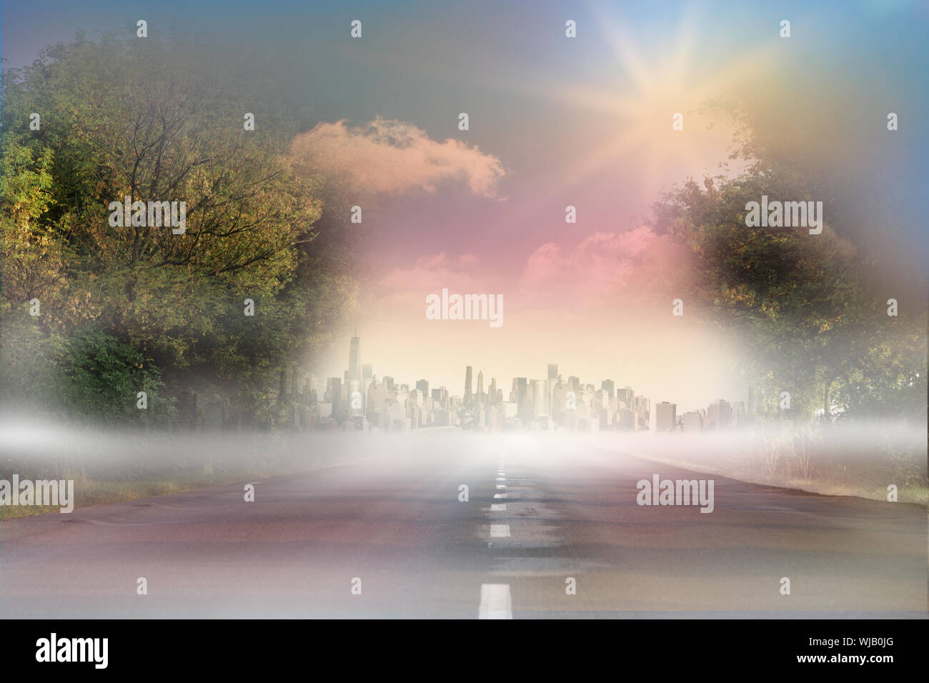 Sunny road leading to city Stock Photo - Alamy