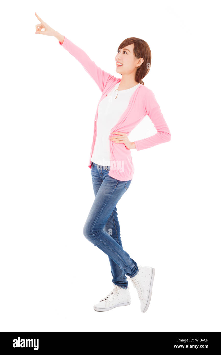 happy young woman finger pointing something Stock Photo - Alamy