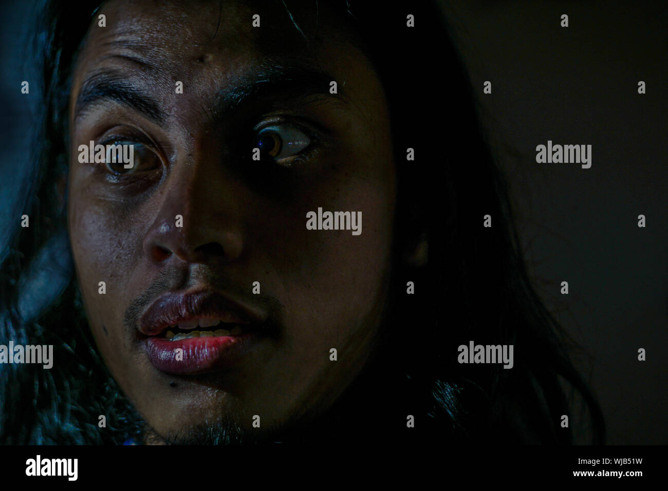 Scared young adult hi-res stock photography and images - Alamy