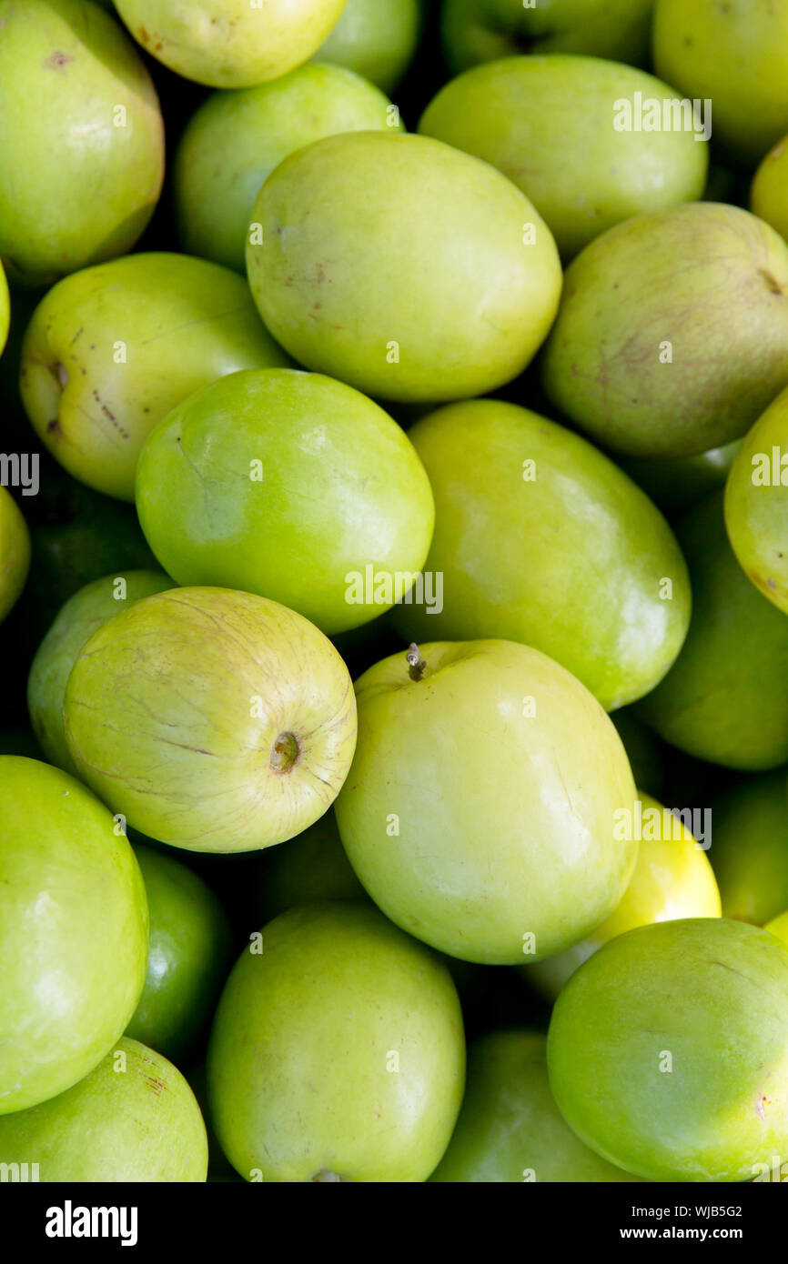 fresh monkey apple fruit background Stock Photo - Alamy