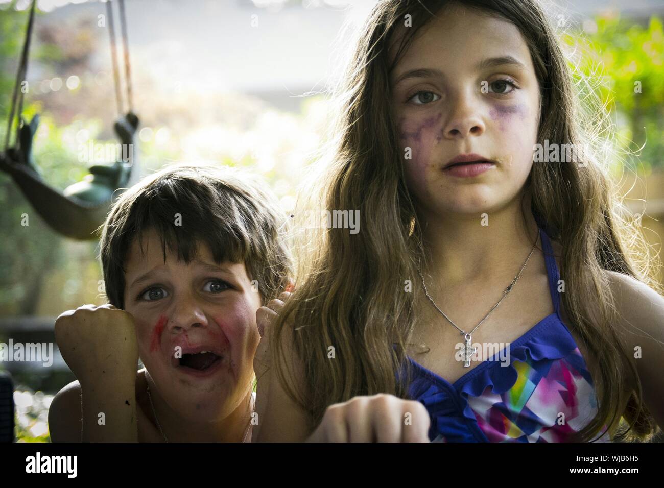 Brother sister face face hi-res stock photography and images - Alamy