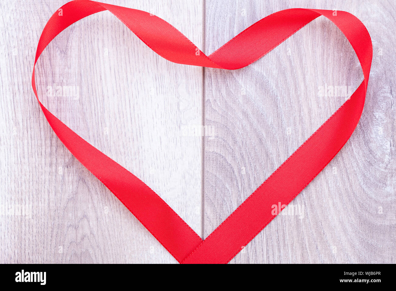 Bouquet of beautiful fresh red roses with a coiled ribbon border ...