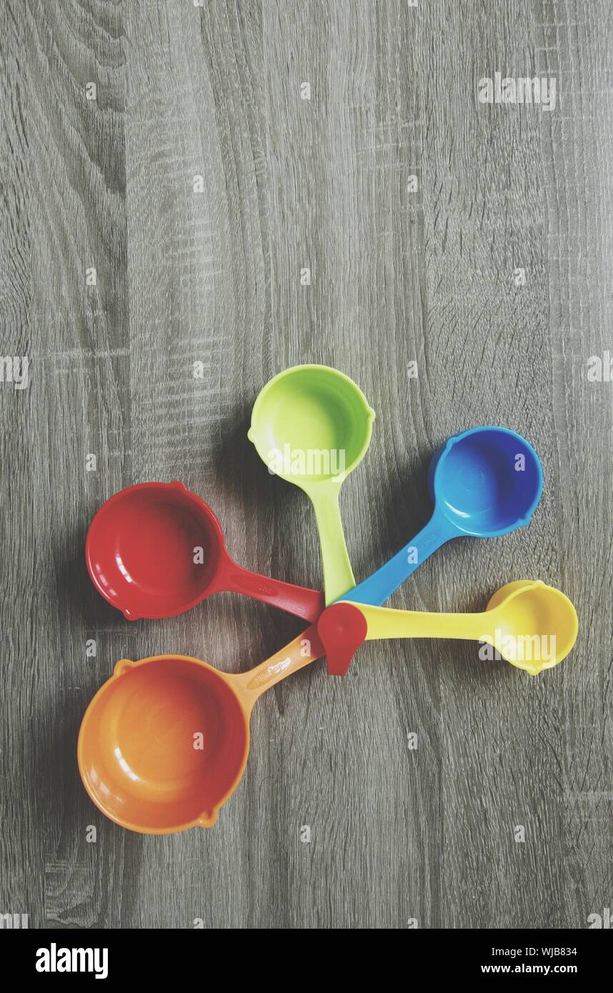 Abstract red spoons on the table hi-res stock photography and images ...