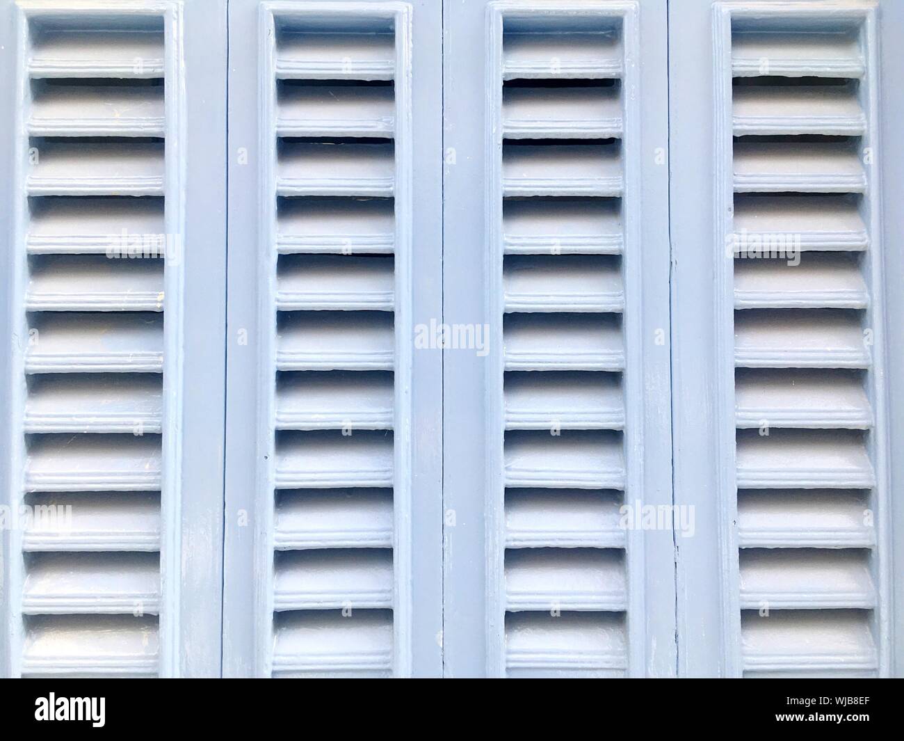 Blue window shutters hi-res stock photography and images - Alamy