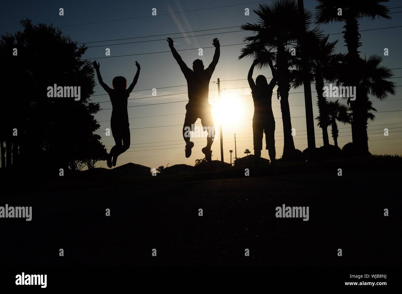 Jumping sunset hi-res stock photography and images - Alamy