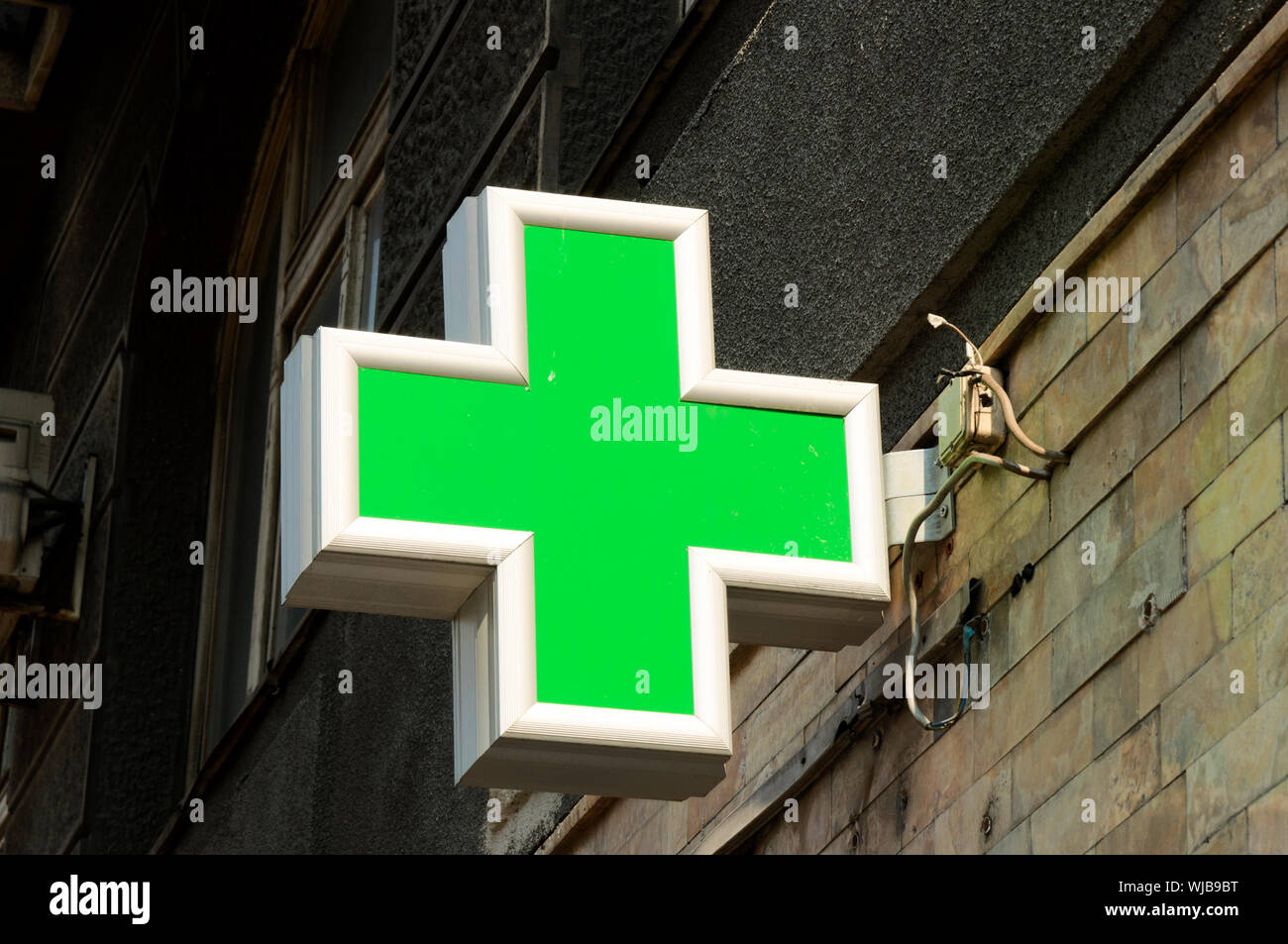 Pharmacy sign on the street Stock Photo - Alamy