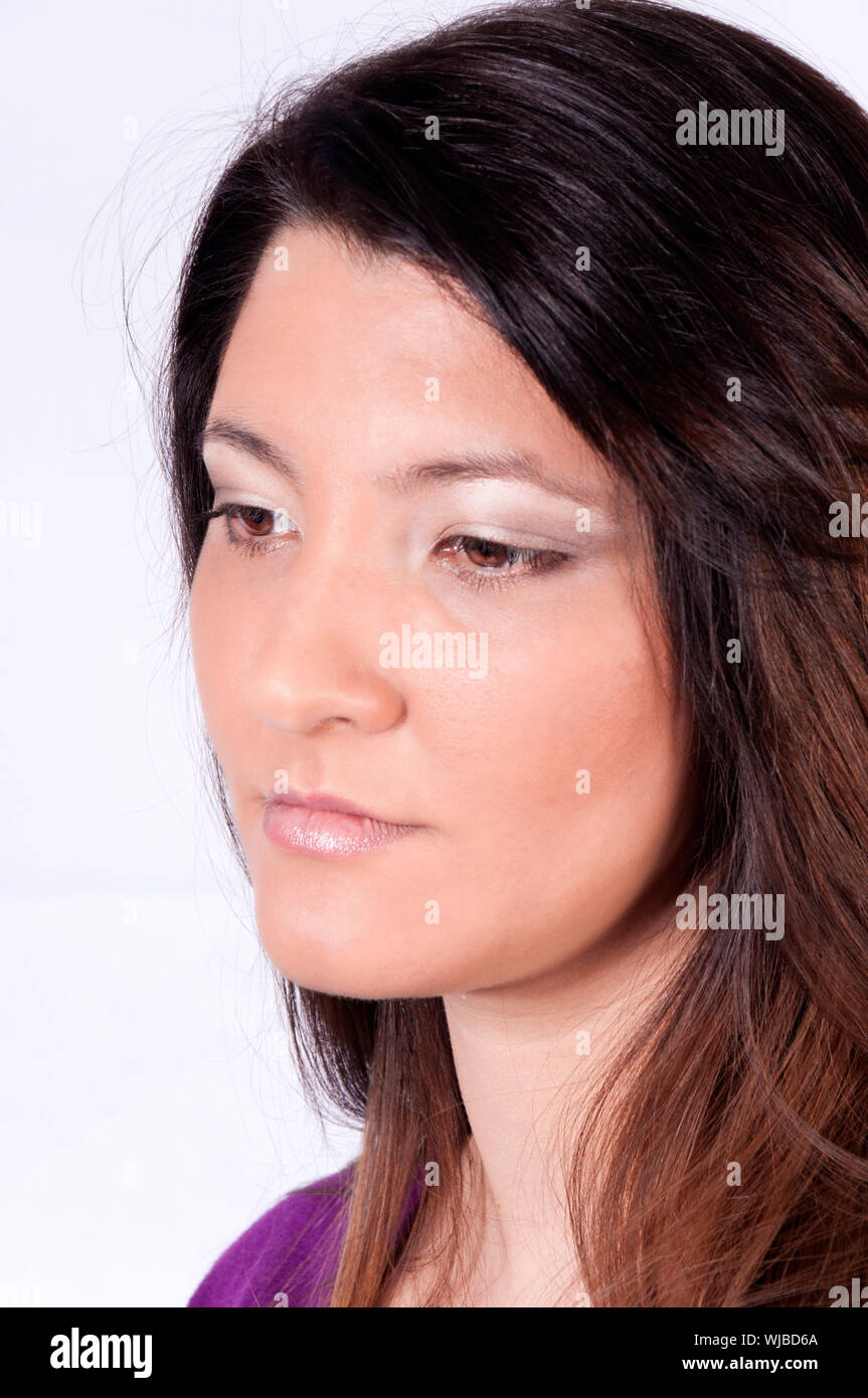 sad female portrait on white background Stock Photo - Alamy