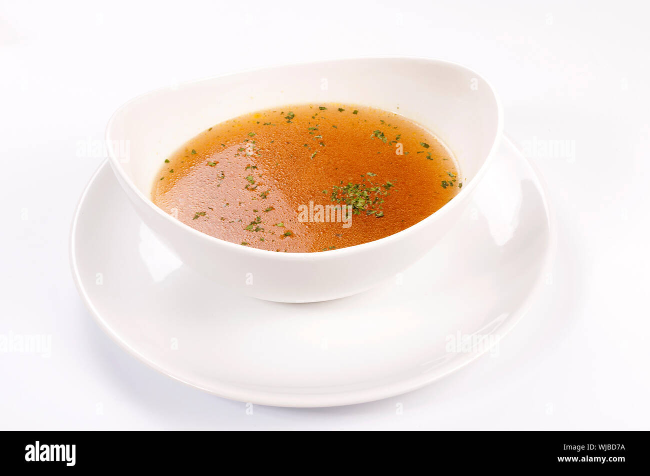 Soup in cup isolated on white Stock Photo - Alamy