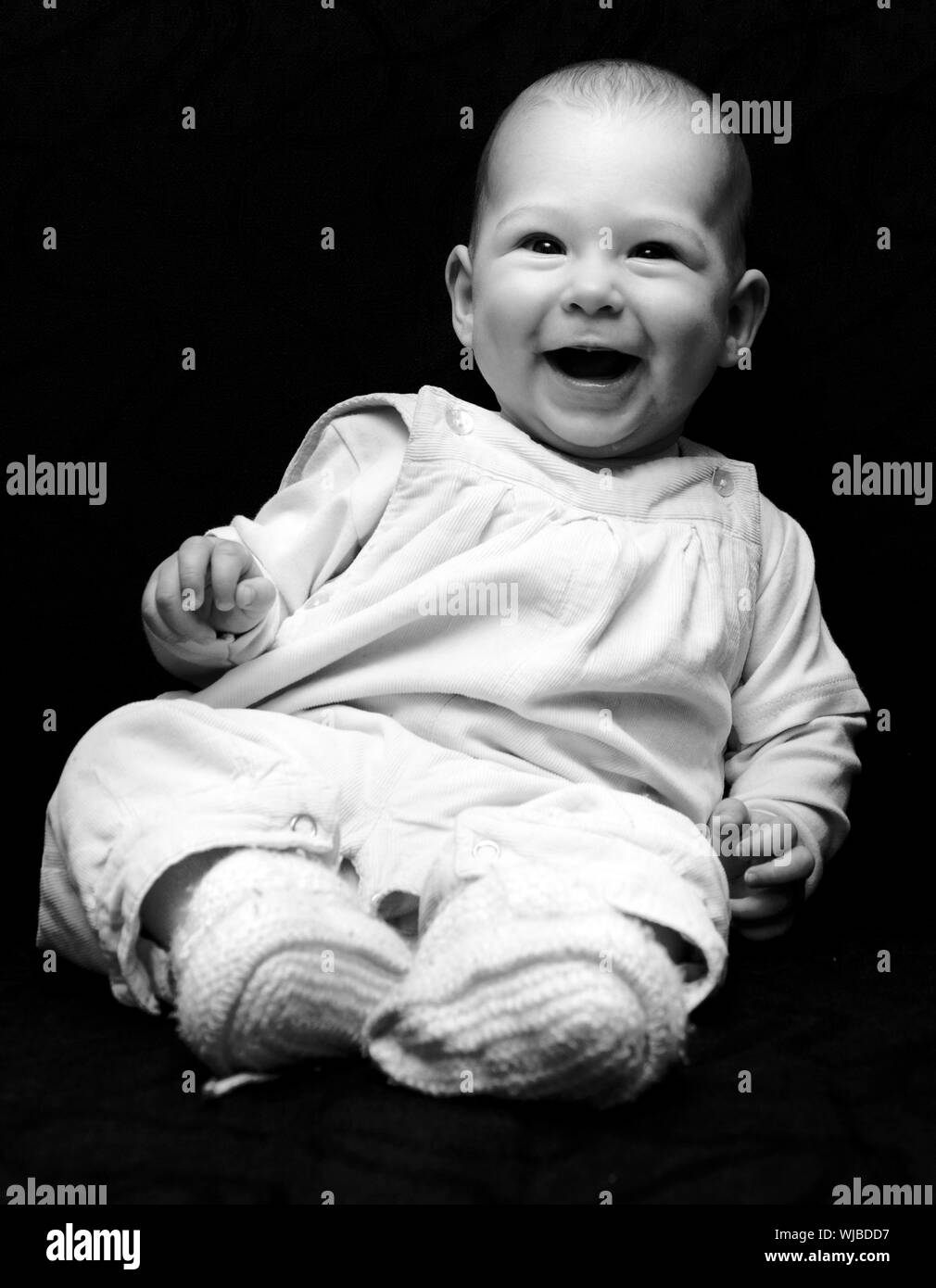 Portrait of little baby girl in low key technique and converted in ...