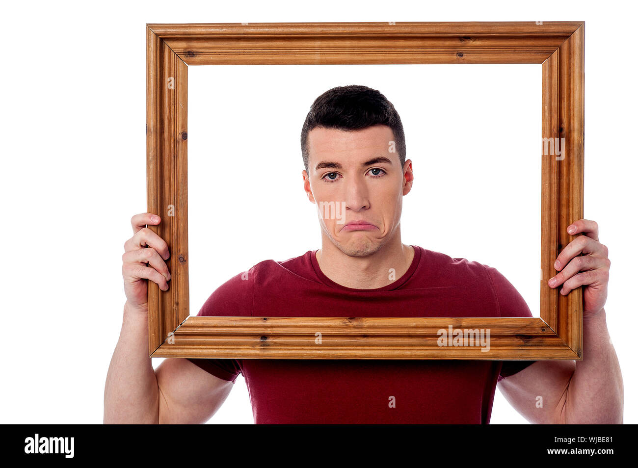 Young man posing framing hi-res stock photography and images - Alamy