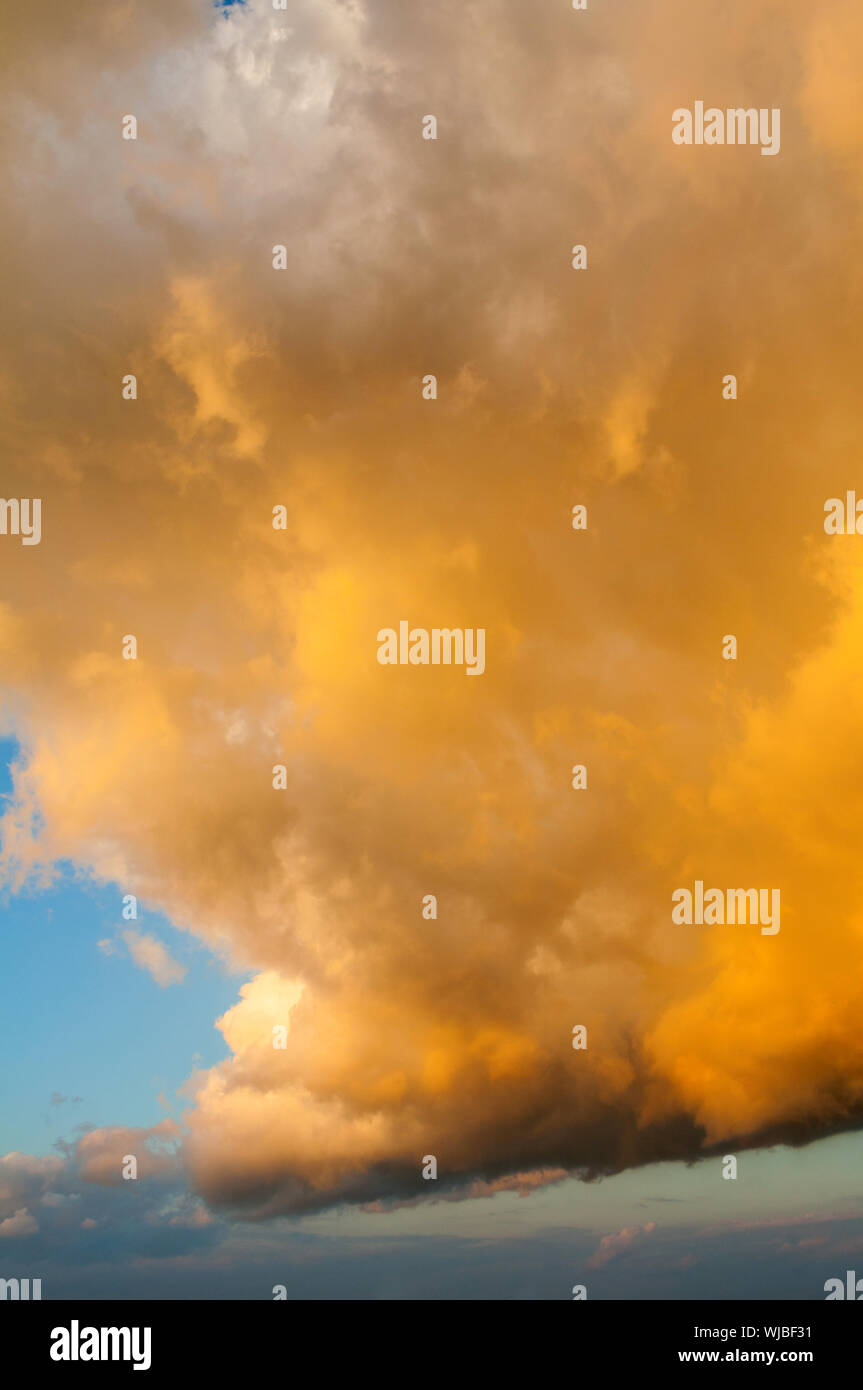 Orange dramatic sky background - picturesque colorful clouds lit by ...