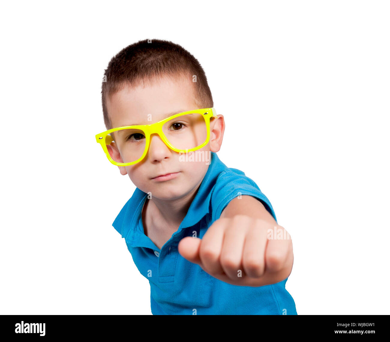 Little boy knocking isolated on white background. Selective focus on ...