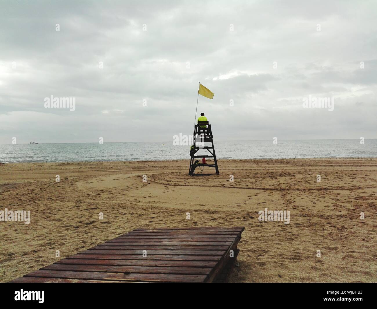 Lifeguard sitting on beach hi-res stock photography and images - Alamy