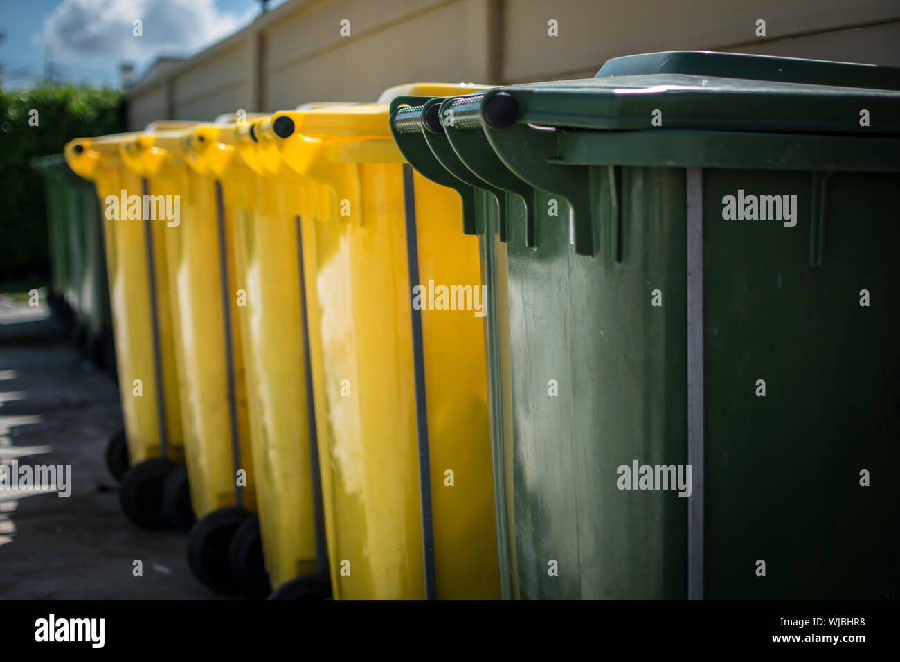 Row of recycling bins hi-res stock photography and images - Alamy