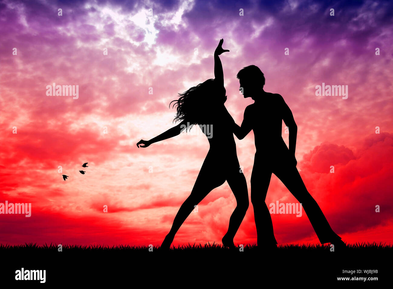 couple dancing at sunset Stock Photo - Alamy
