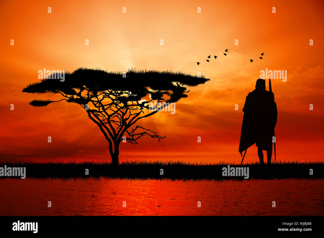 African man at sunset Stock Photo - Alamy