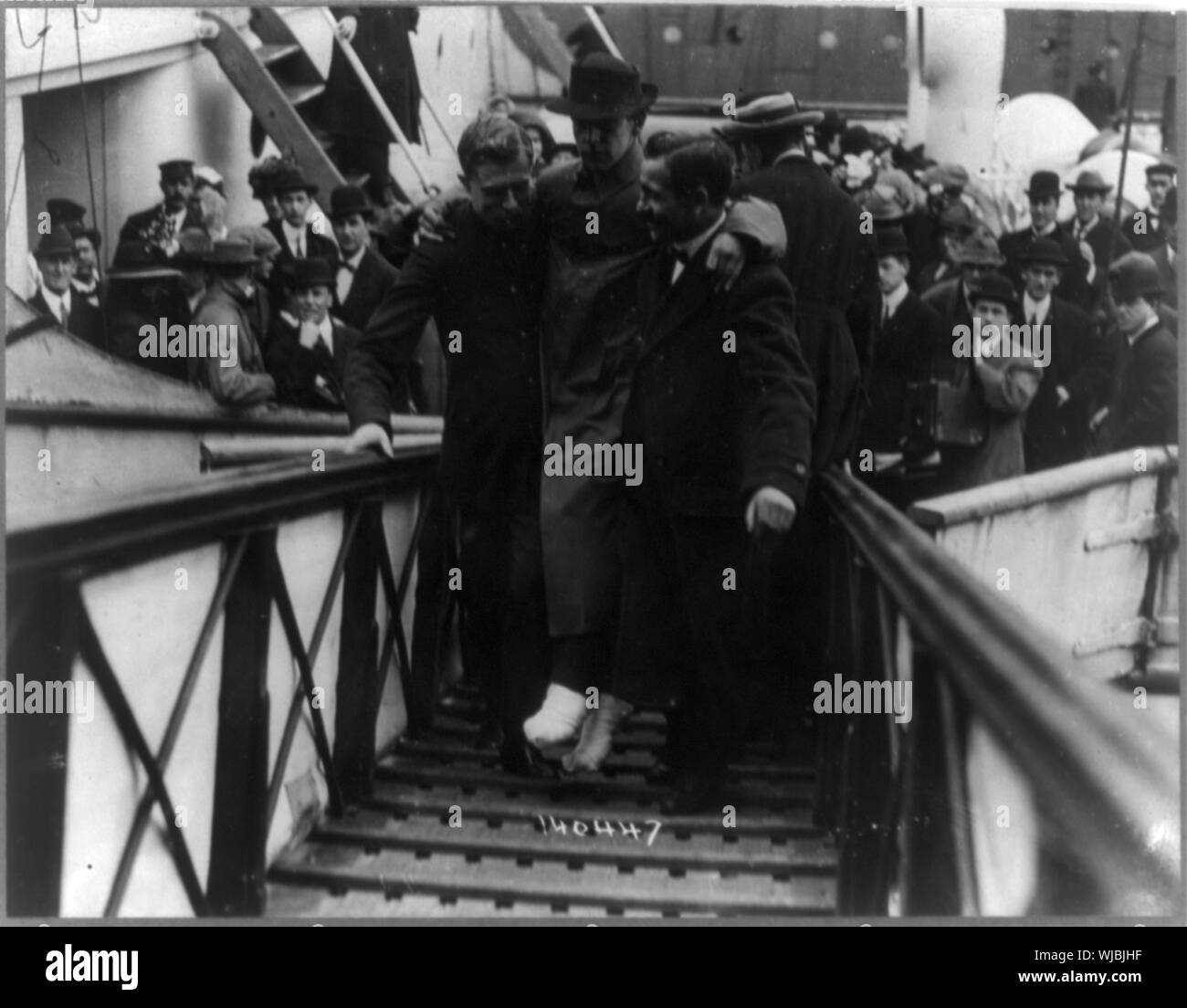 Harold Bride, surviving wireless operator of the TITANIC, with feet ...