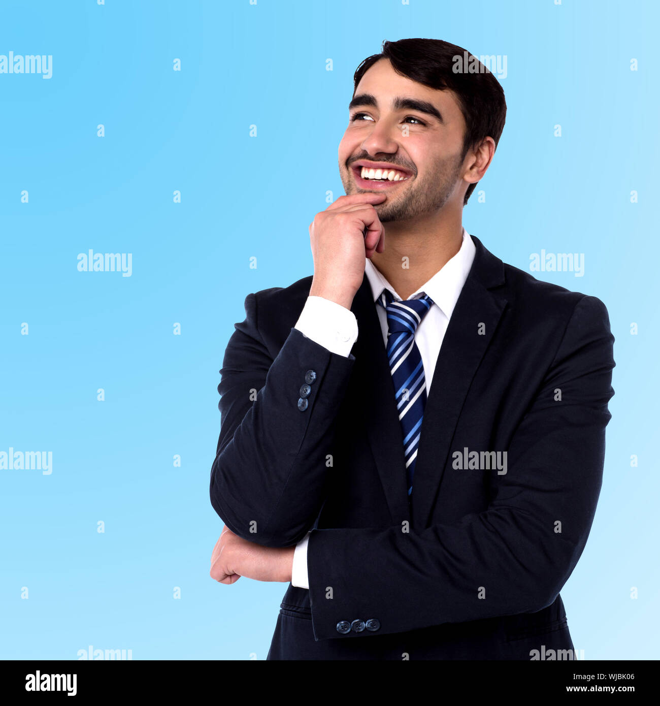 Corporate guy recalling his golden days Stock Photo - Alamy