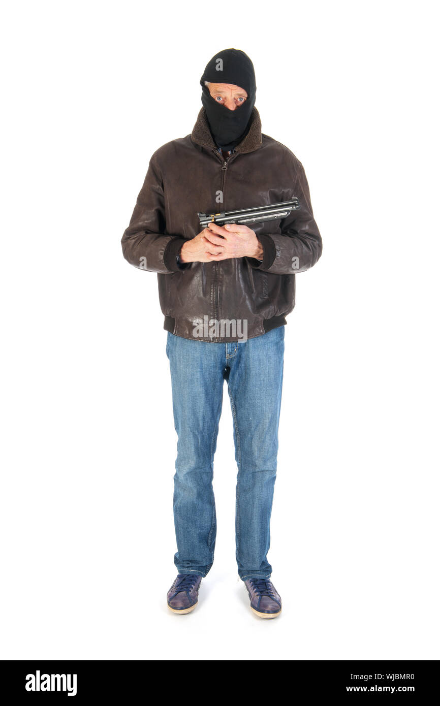 Sniper with gun in the studio Stock Photo - Alamy