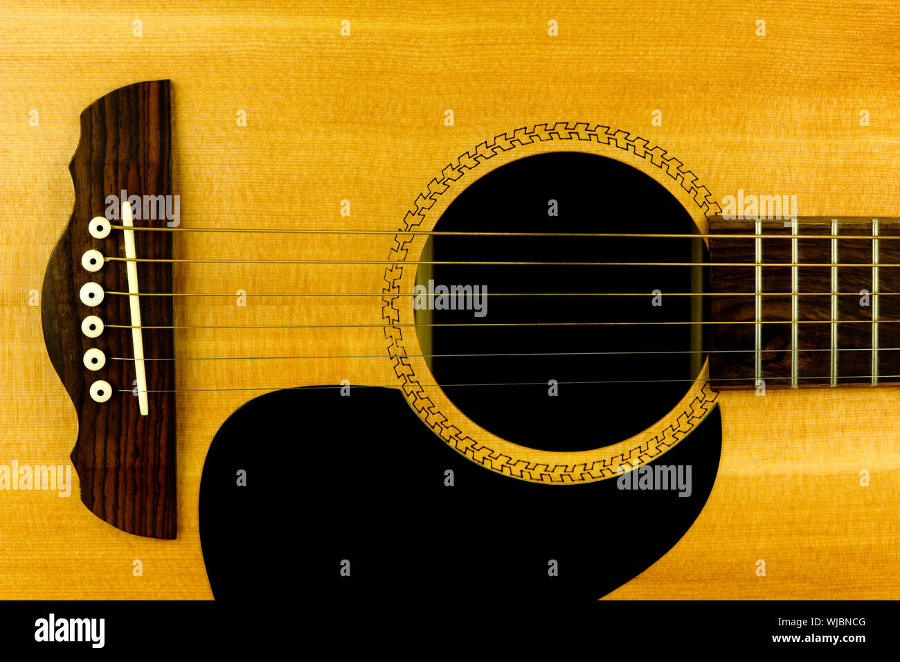 Close up view of acoustic guitar body Stock Photo - Alamy